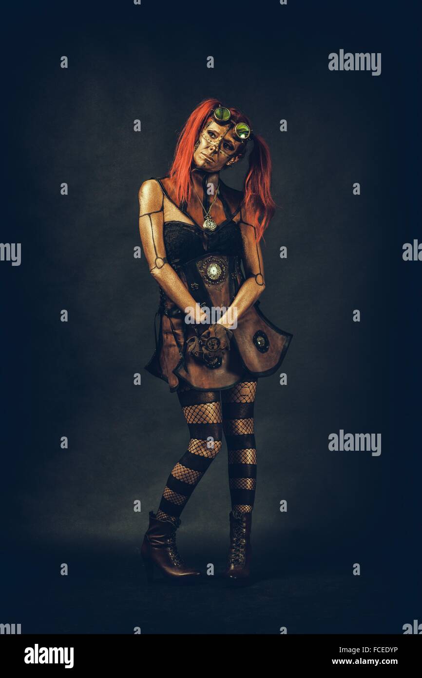Steampunk robot woman with red hair Stock Photo - Alamy