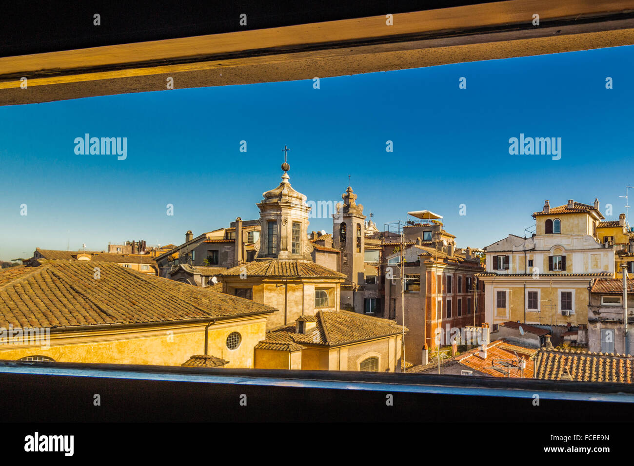 ancient roofs of Rome, Italy through a window Stock Photo - Alamy