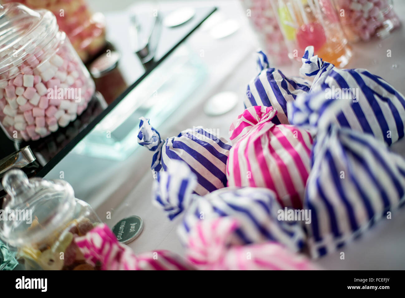 Red boiled sweets hi-res stock photography and images - Alamy
