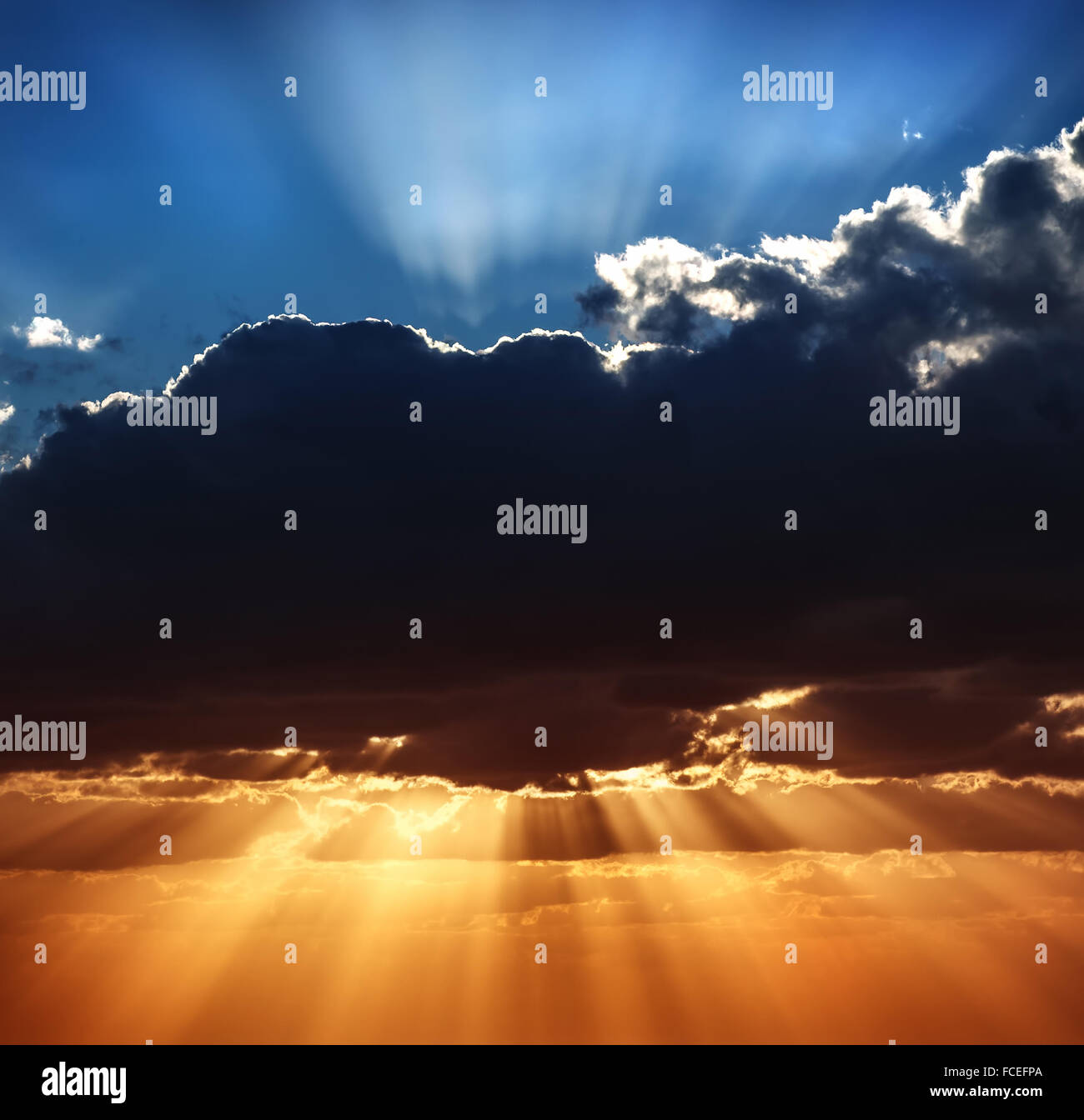 Beautiful heaven landscape, blue and yellow sky, amazing view on sun ...