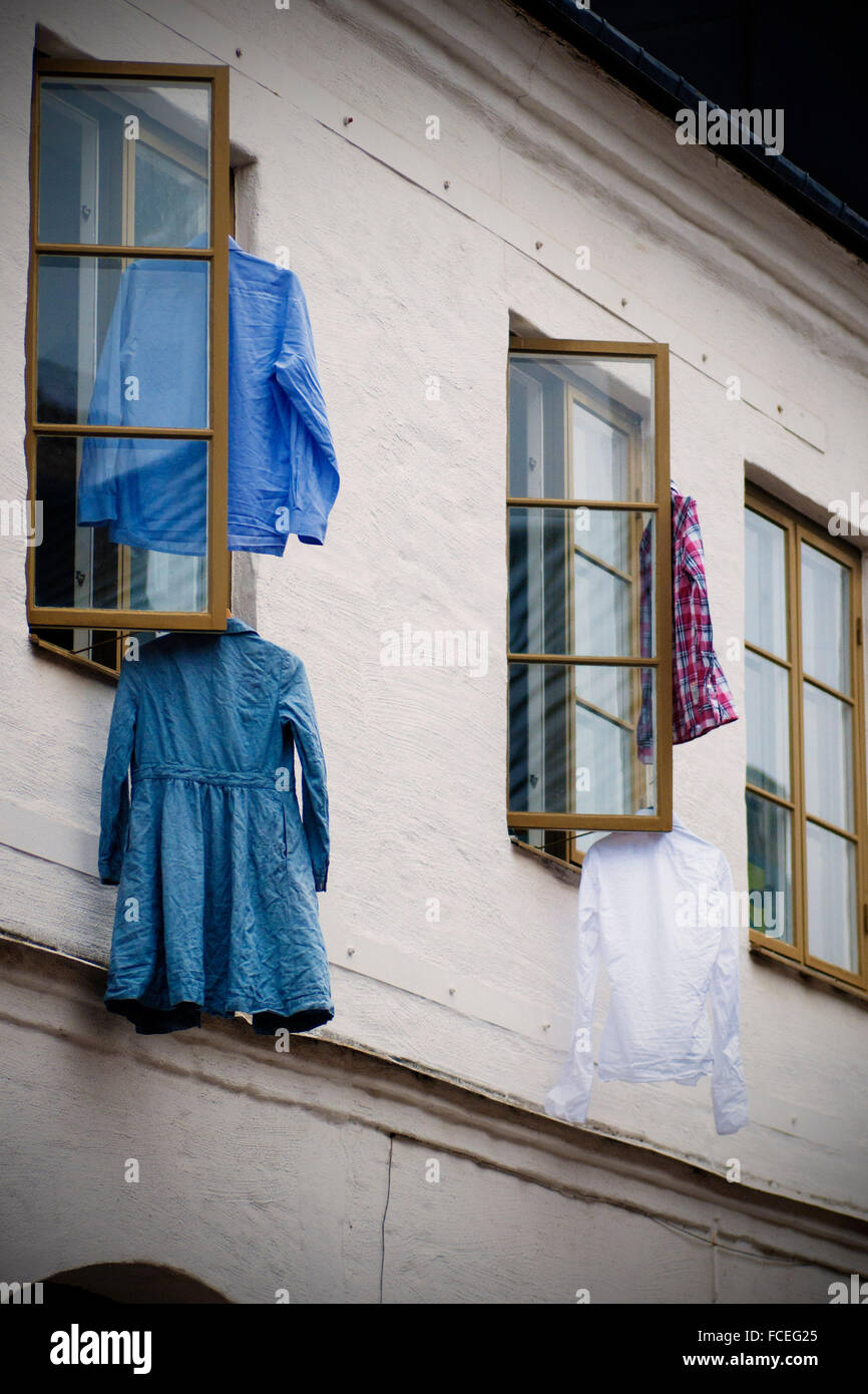Close-Up Of Clothes Hanging On Windows Stock Photo - Alamy