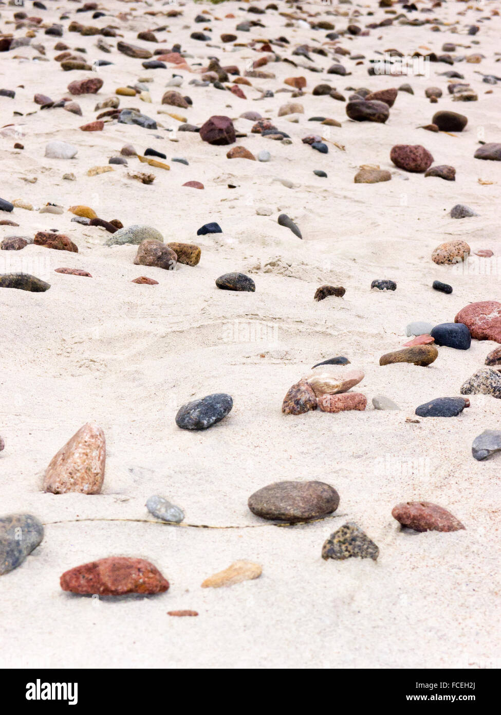 Sea stones on sand hi-res stock photography and images - Alamy