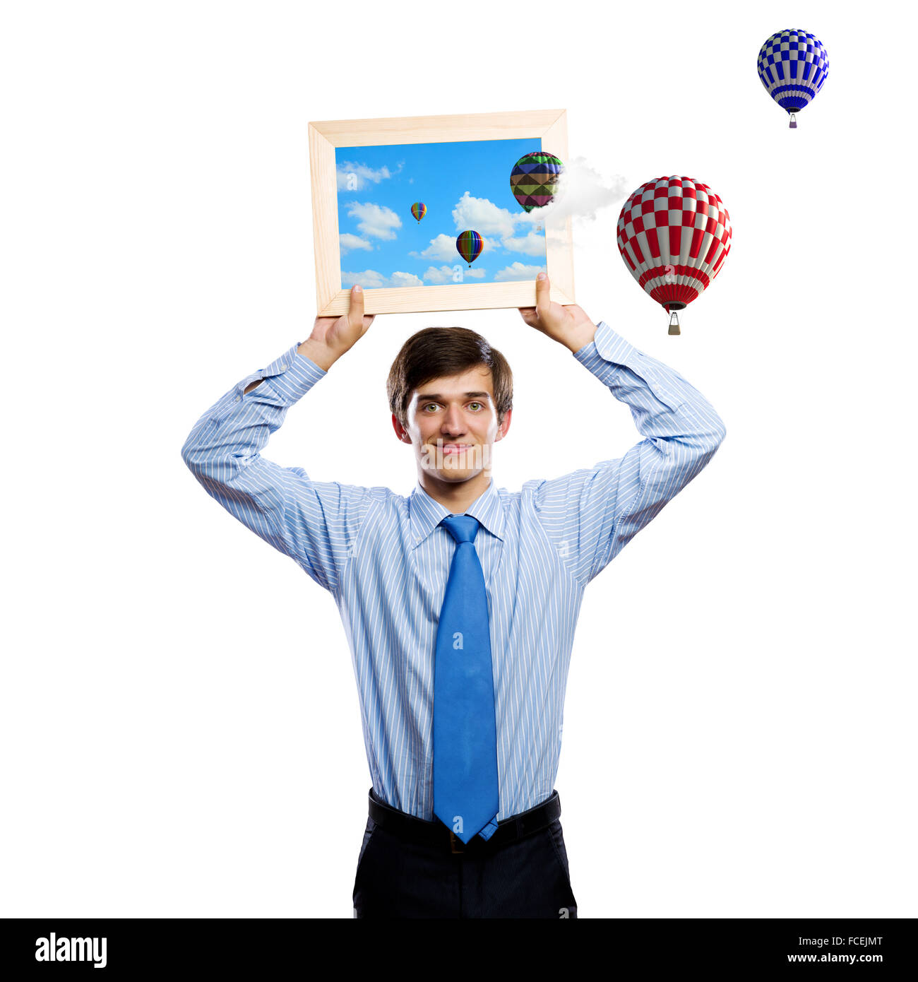 Handsome young man holding frame with pictures Stock Photo - Alamy