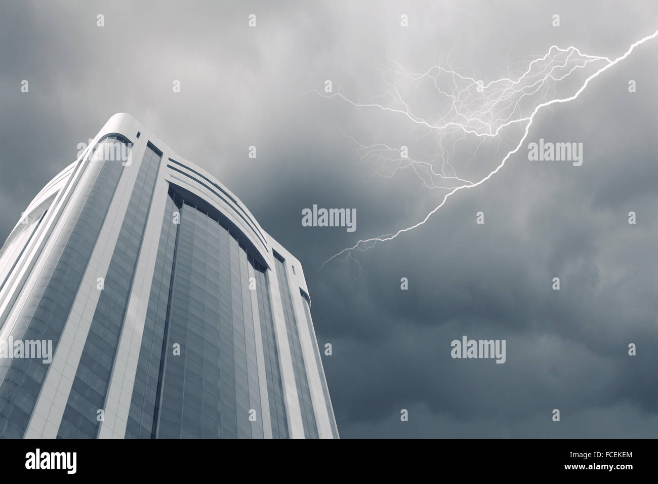 Bottom image of skyscraper with thunder lightning in sky Stock Photo ...