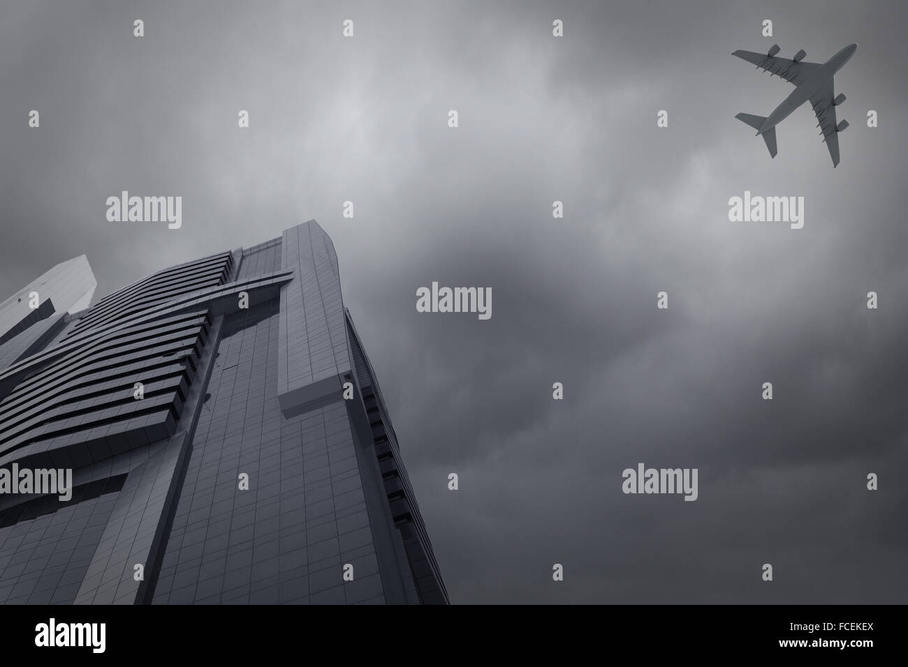 Bottom view of airplane flying above skyscrapers Stock Photo - Alamy