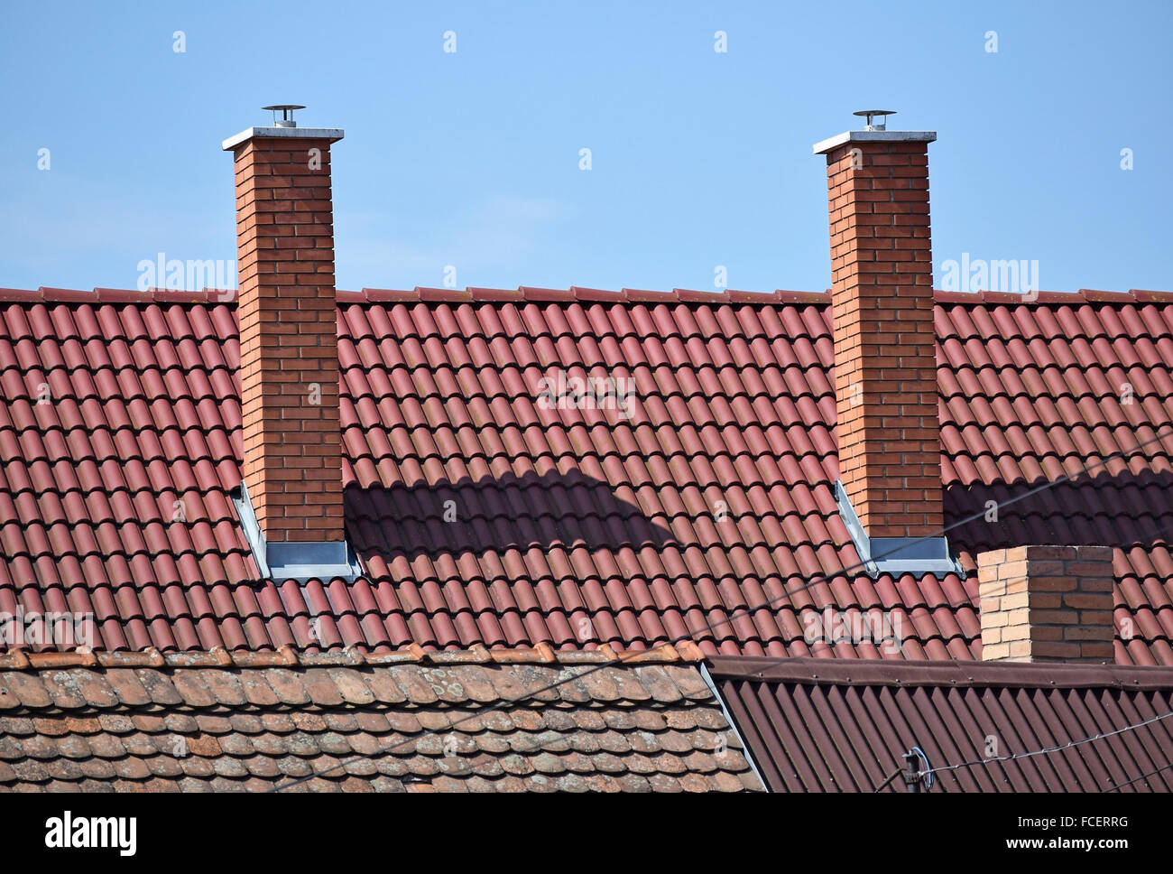 Smoke stacks on the roof Stock Photo - Alamy
