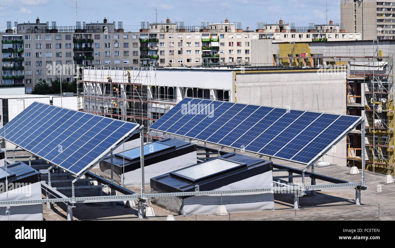 Solar panels on the top of a building Stock Photo - Alamy