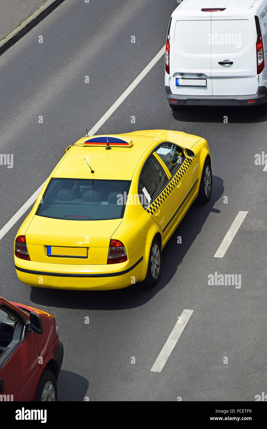Red taxi on side street hi-res stock photography and images - Alamy