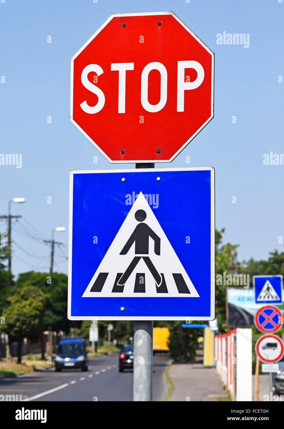 Stop and pedestrian crossing signs Stock Photo - Alamy