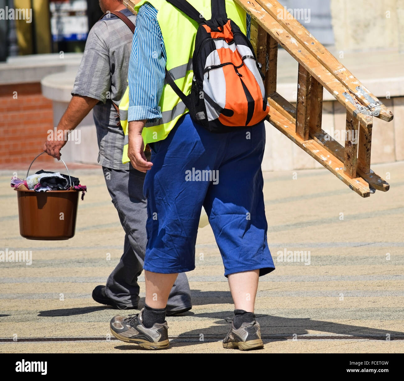 Two men ladder hi-res stock photography and images - Alamy