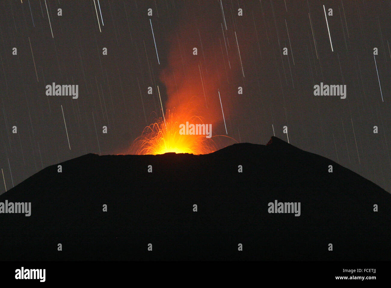 Volcano Erupting In Mountains Stock Photo - Alamy