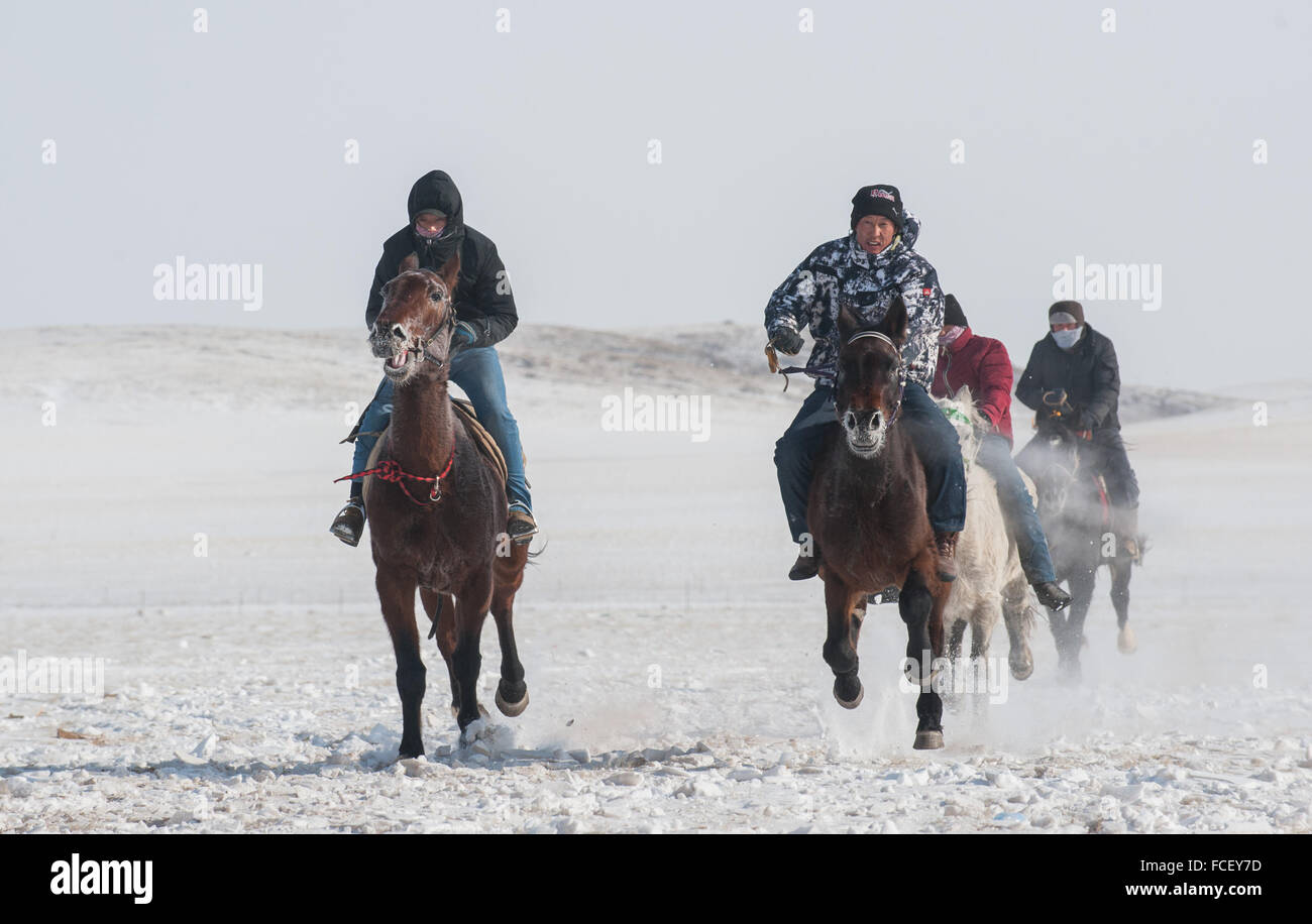 Bayannur, Bayannur. 22nd Jan, 2016. Men ride on horseback during Naadam ...