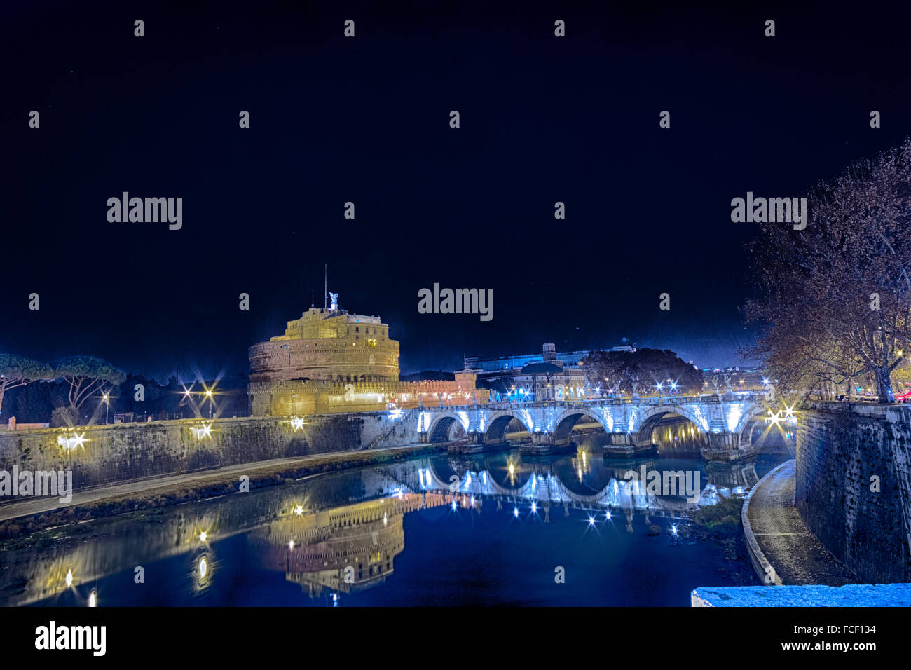 Night view of bridge on Tiber river in Rome, Italy Stock Photo - Alamy