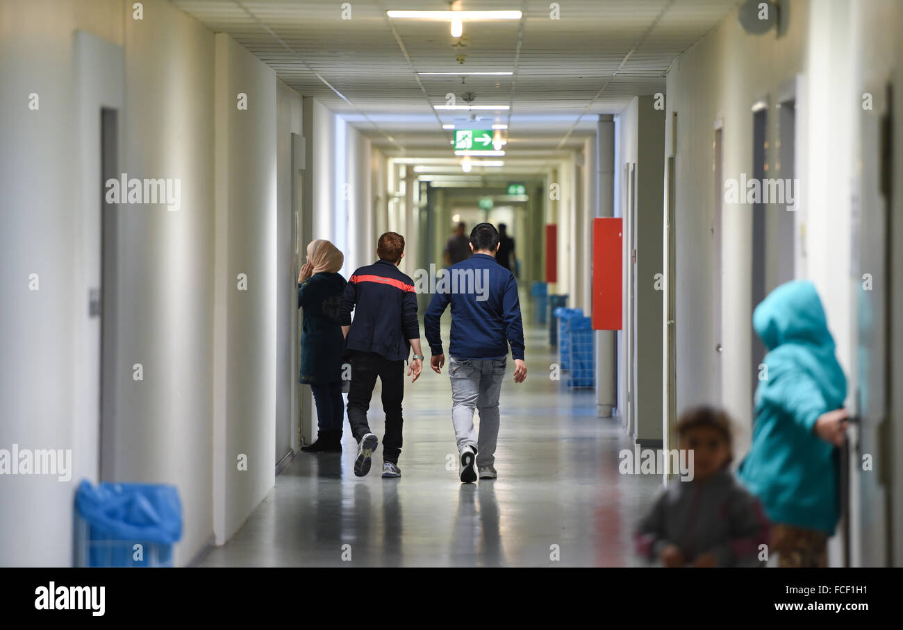 Frankfurt, Germany. 22nd Jan, 2016. Refugees walking through a corridor ...