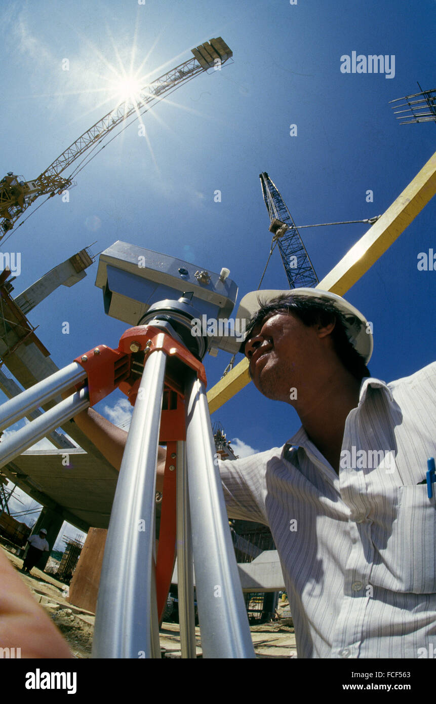 Chinese building surveyor on site Stock Photo - Alamy