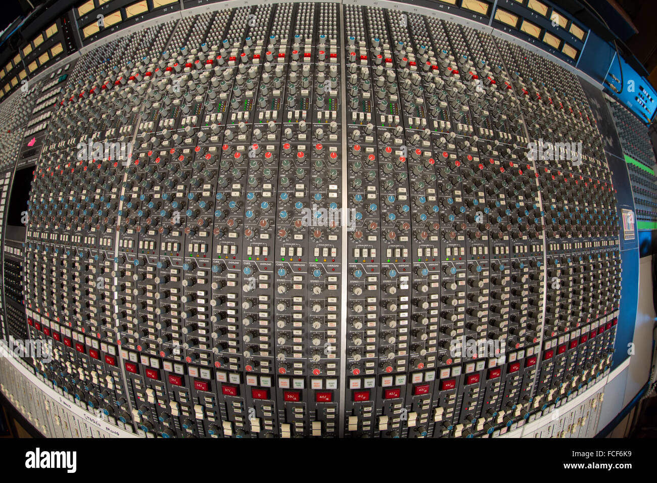 above fish eye view of ssl e series sound mixing desk showing buttons ...