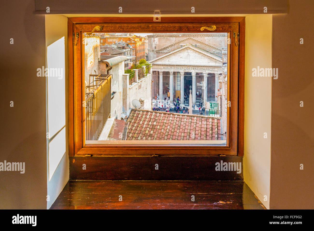 window overlooking the rooftops of Rome, historic palaces, Catholic ...