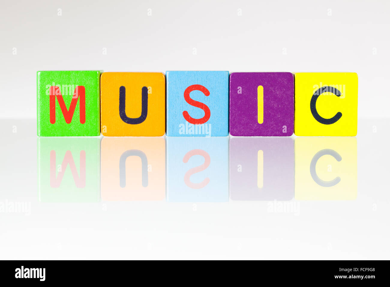 Music - an inscription from children's wooden blocks Stock Photo - Alamy
