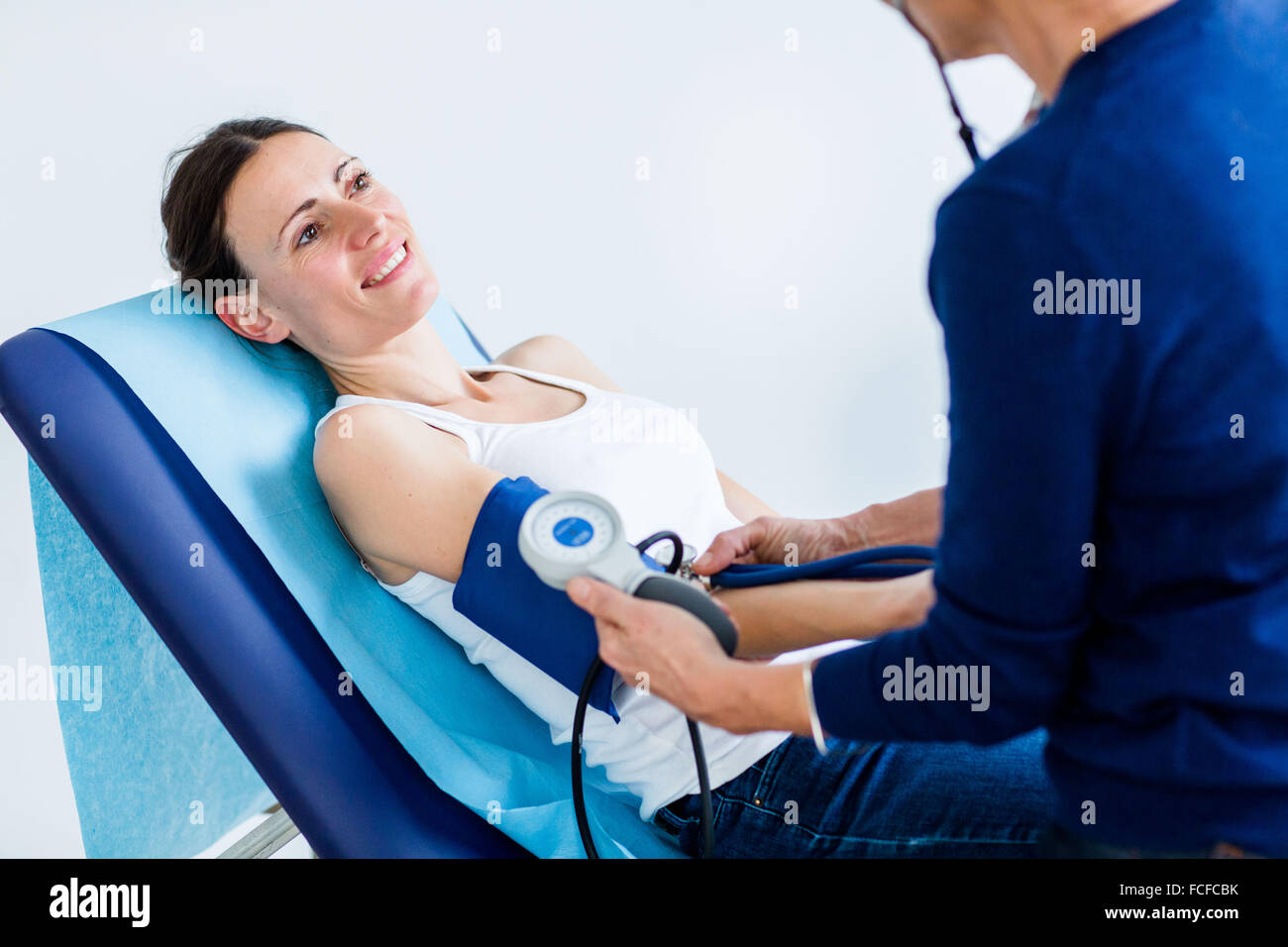 Doctor woman blood pressure hi-res stock photography and images - Alamy
