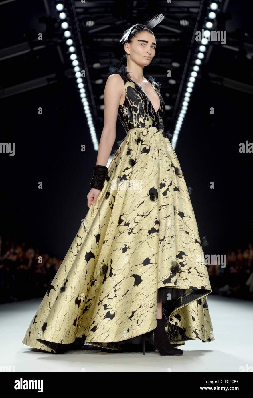 Berlin, Germany. 22nd Jan, 2016. A model presents a creation of fashion ...