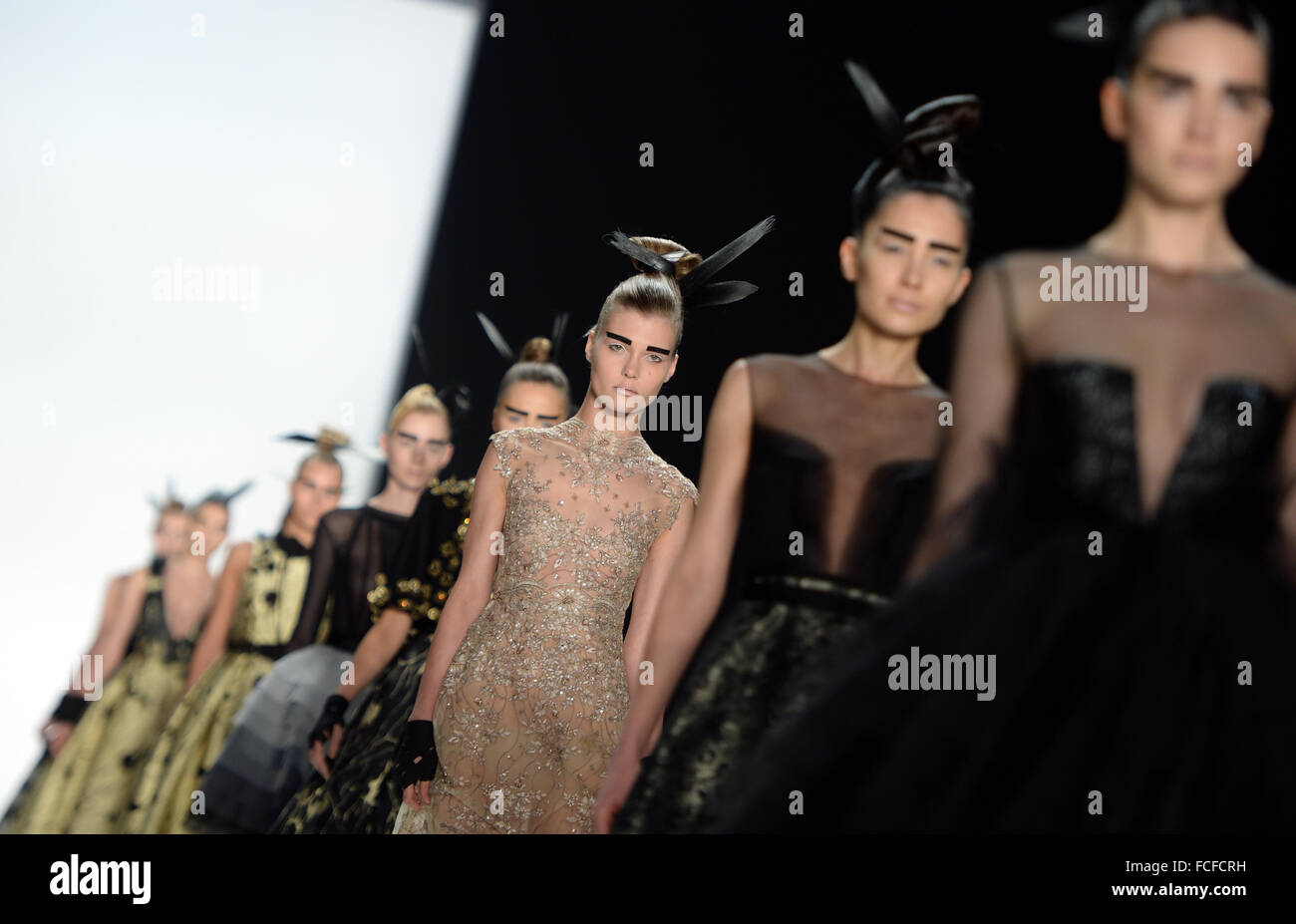Berlin, Germany. 22nd Jan, 2016. Models present creations of fashion ...