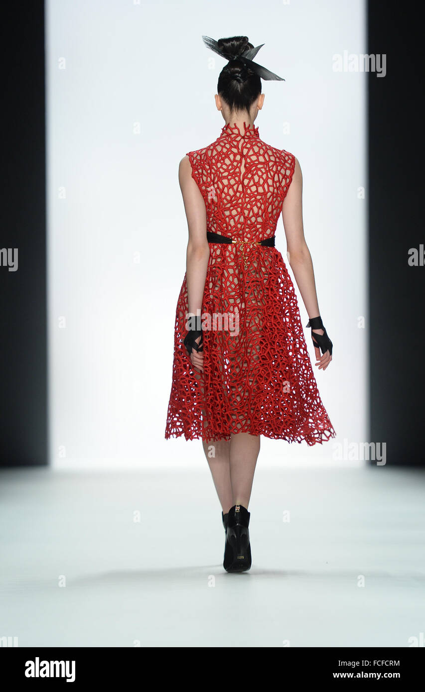 Berlin, Germany. 22nd Jan, 2016. A model presents a creation of fashion ...