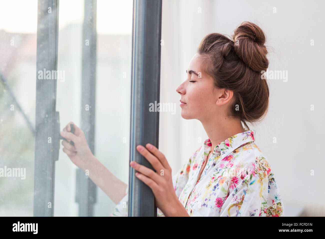 Woman closed eyes looking up breathing hi-res stock photography and ...