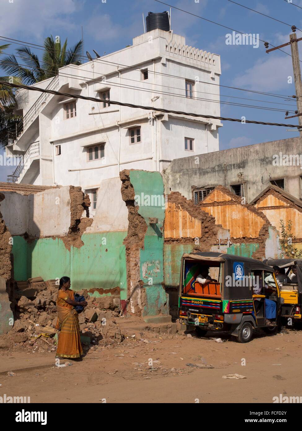 Street scene and ruined buildings cut in half to make way for highways ...