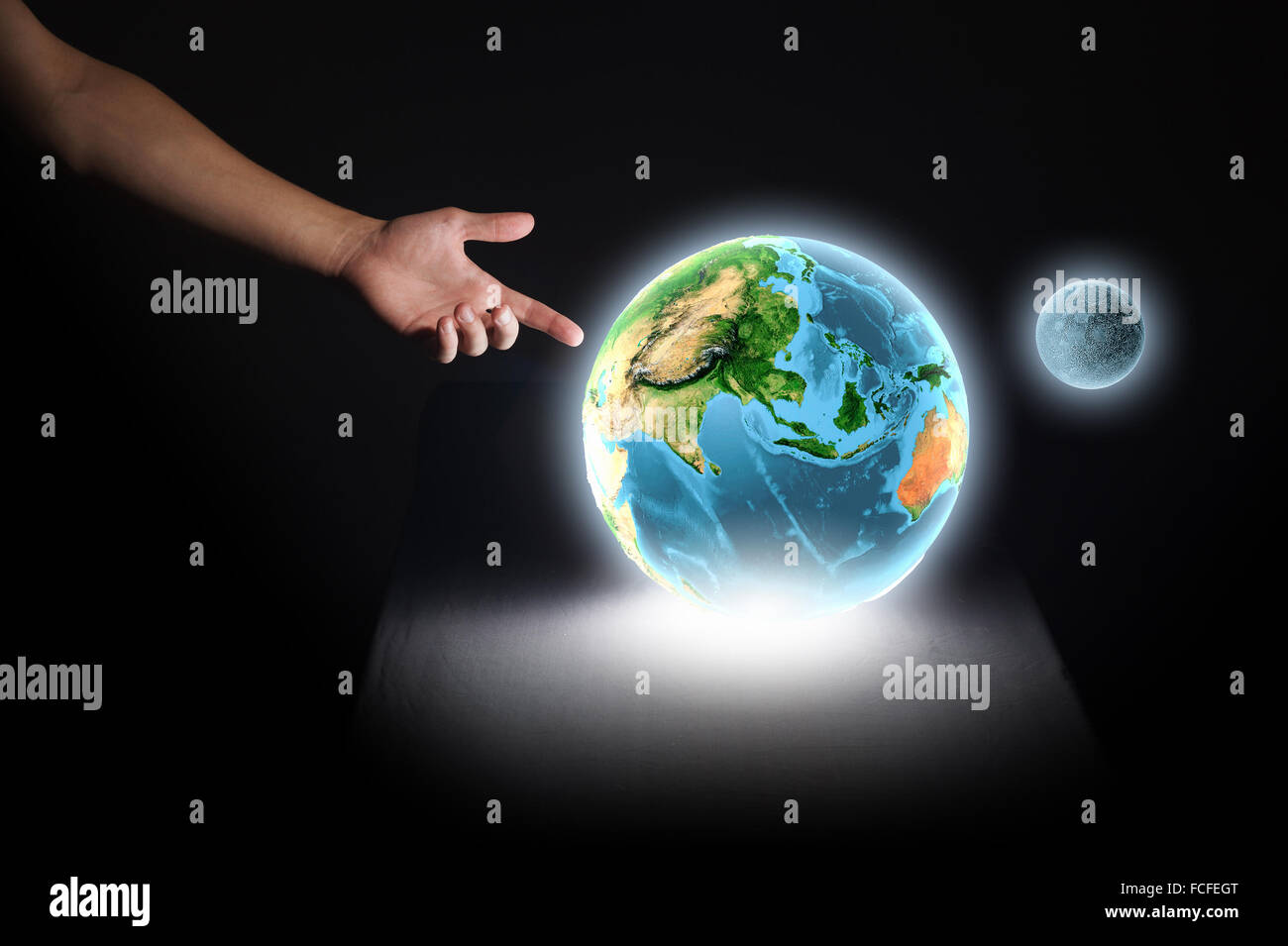 Close up of human hand holding Earth planet. Elements of this image are ...