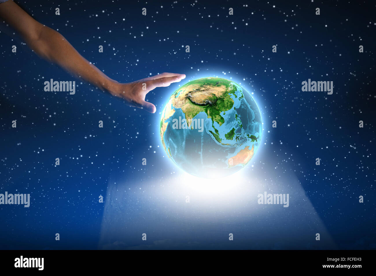 Close up of human hand holding Earth planet. Elements of this image are ...