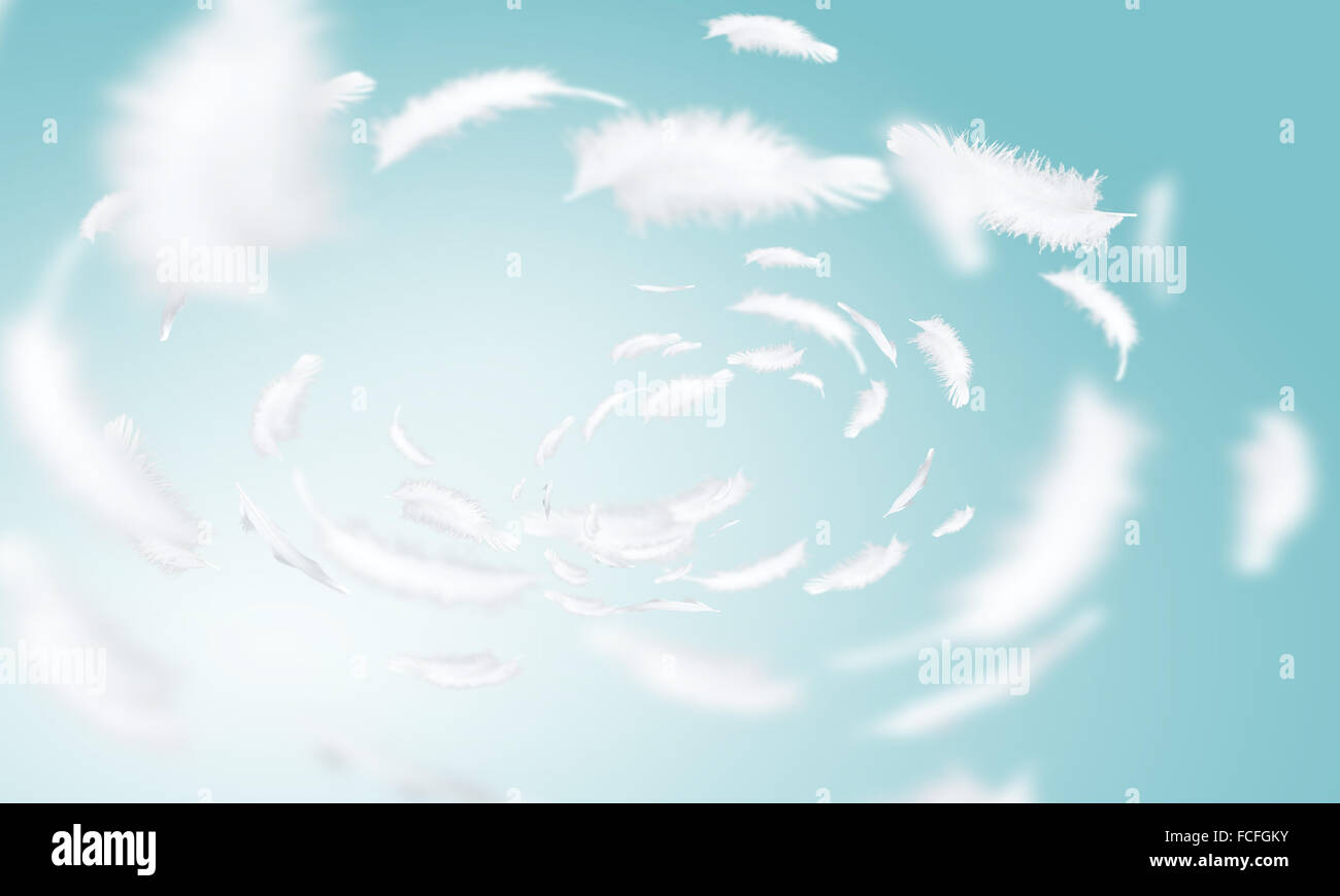 Abstract background image of feathers flying in air Stock Photo - Alamy