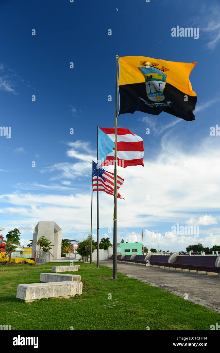 USA, Puerto Rico and Arroyo flags waving at the boardwalk. Arroyo ...