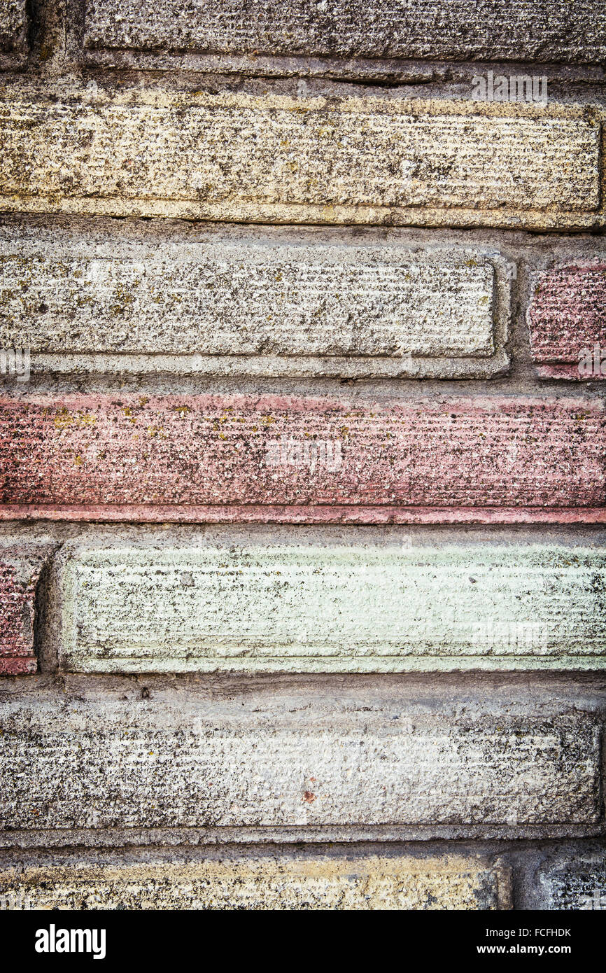 Detail of colorful brick wall. Vertical composition Stock Photo - Alamy