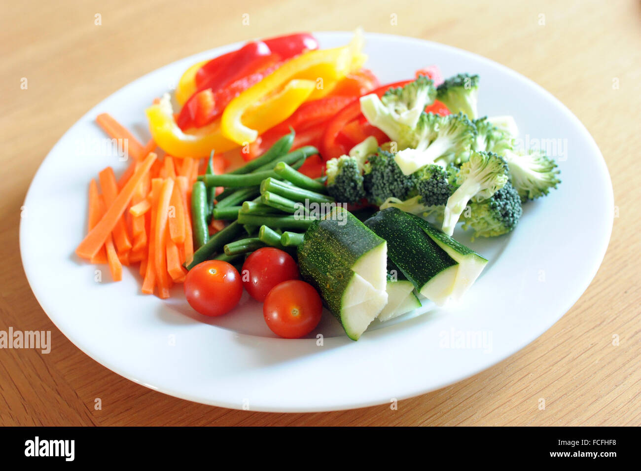 Plate of prepared raw vegetables Stock Photo - Alamy