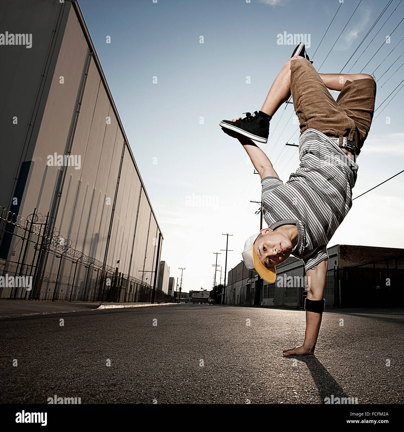 A young person with a boombox on the street of a city Stock Photo - Alamy
