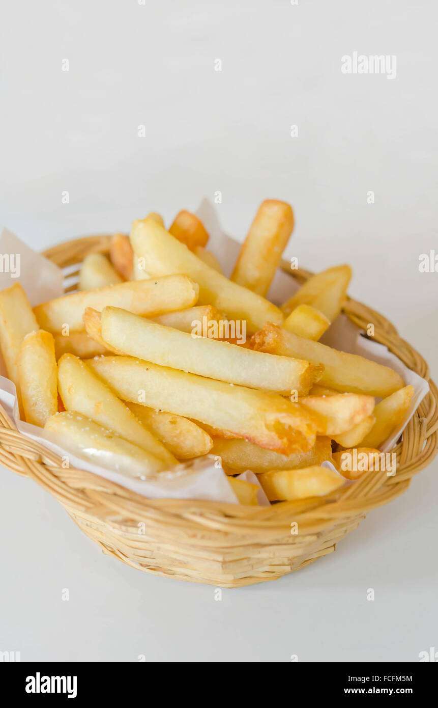 Traditional French fries in a bamboo basket Stock Photo - Alamy