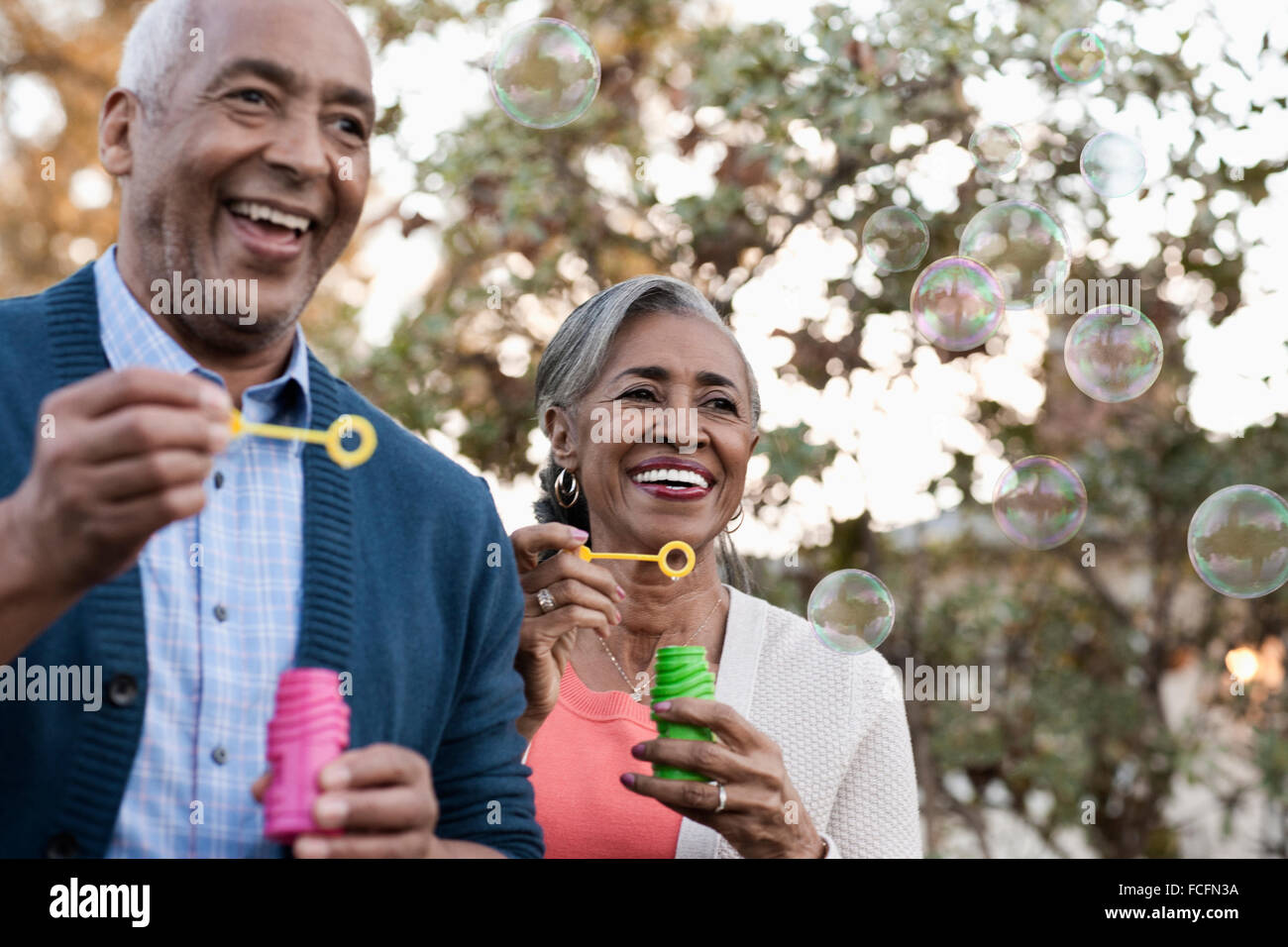 Mature woman blowing bubbles hi-res stock photography and images - Alamy
