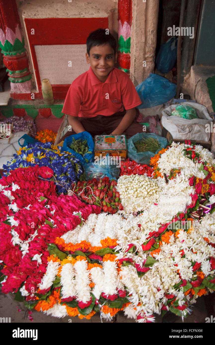 Boy selling flowers, Varanasi, India Stock Photo - Alamy
