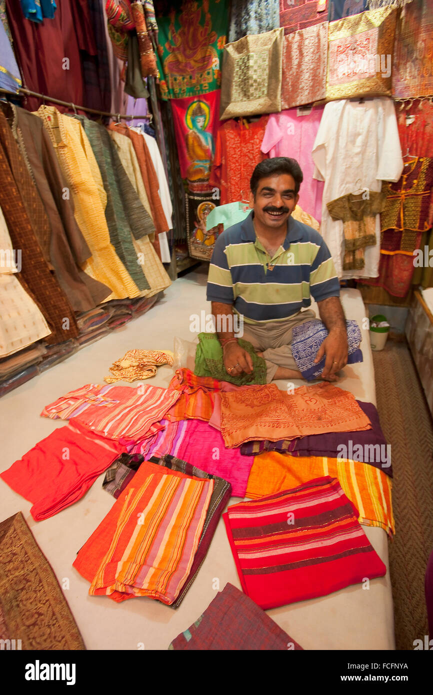 Fabric store and male salesman, Varanasi, India Stock Photo - Alamy