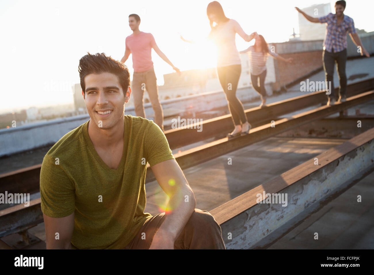 People on rooftop hi-res stock photography and images - Alamy