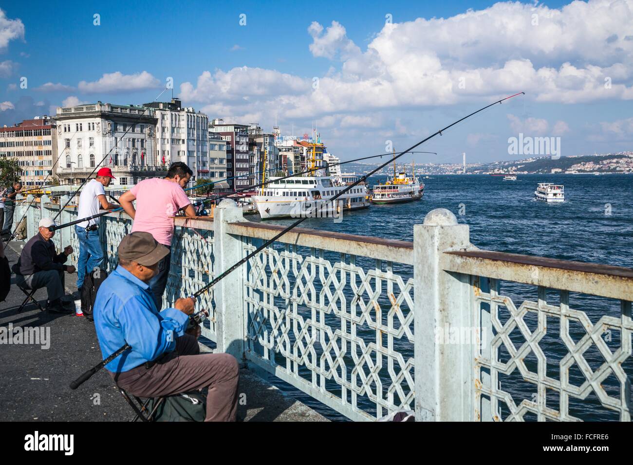 Fishing from the Galata Bridge in Istanbul, Turkey, Eurasia Stock Photo ...