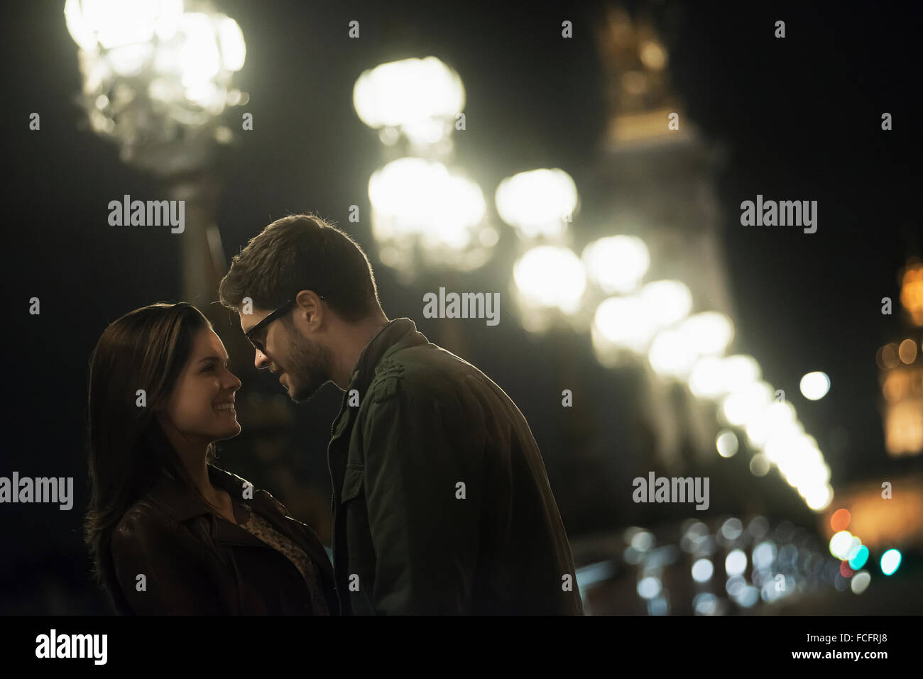 Romantic couple in paris kissing hi-res stock photography and images ...