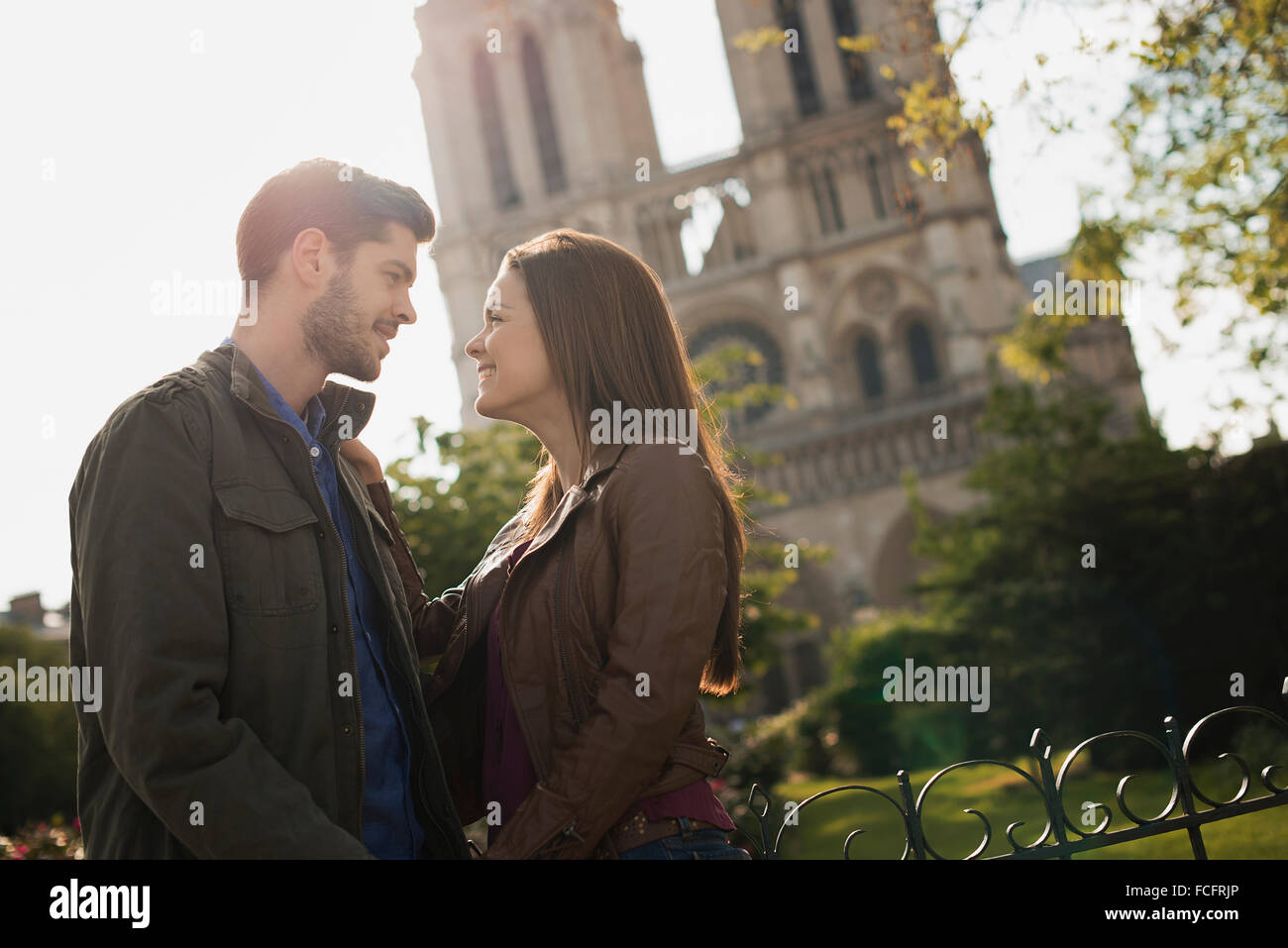 Two people, a couple standing close together in a historic city Stock ...