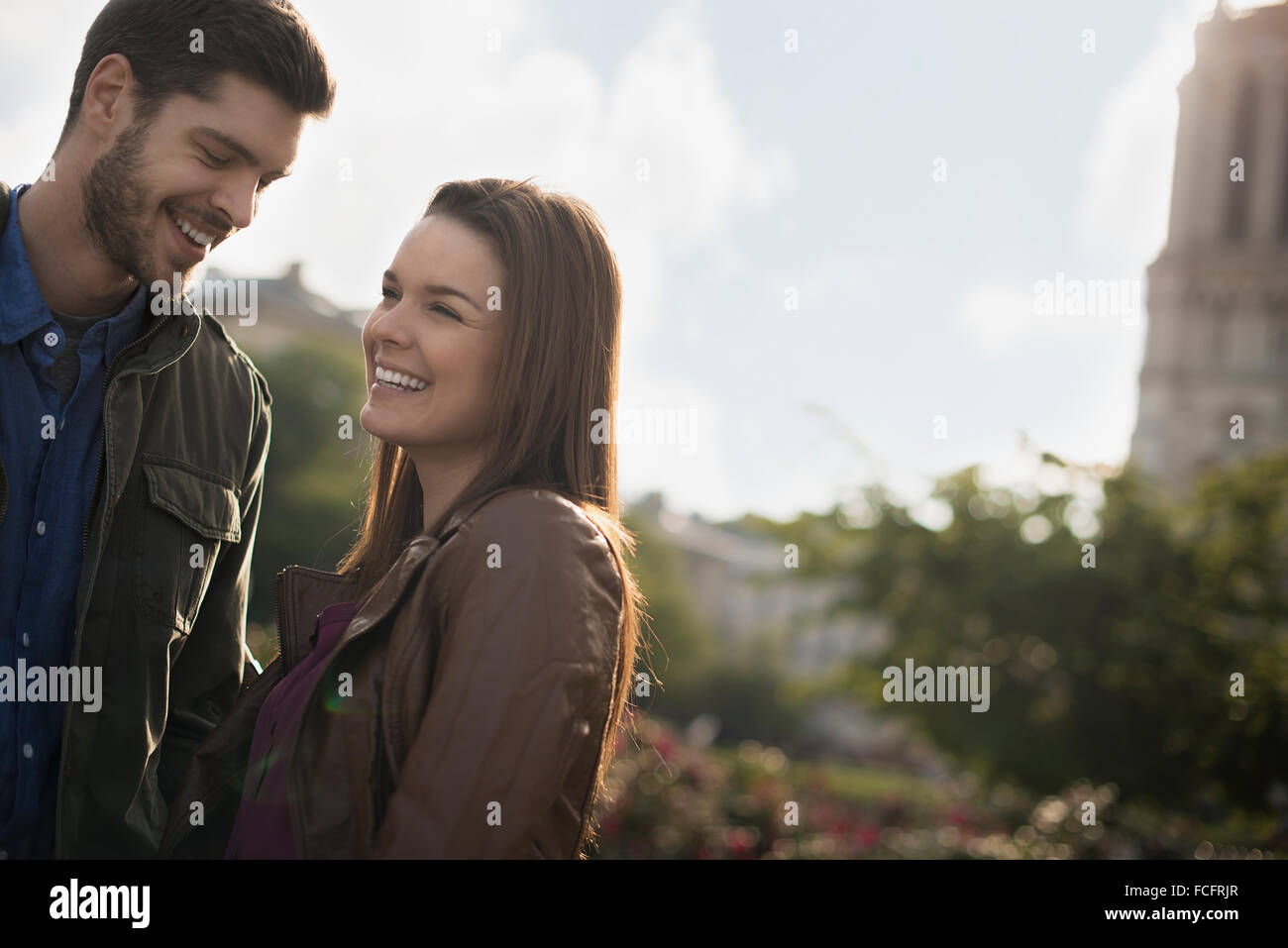 Two people, a couple standing close together in a historic city Stock ...