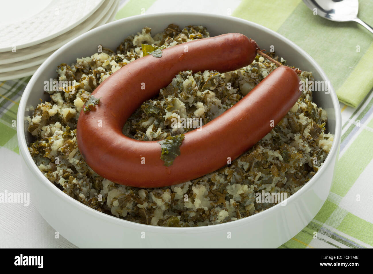 Traditional dutch dish with stewed curly kale and smoked sausage Stock ...