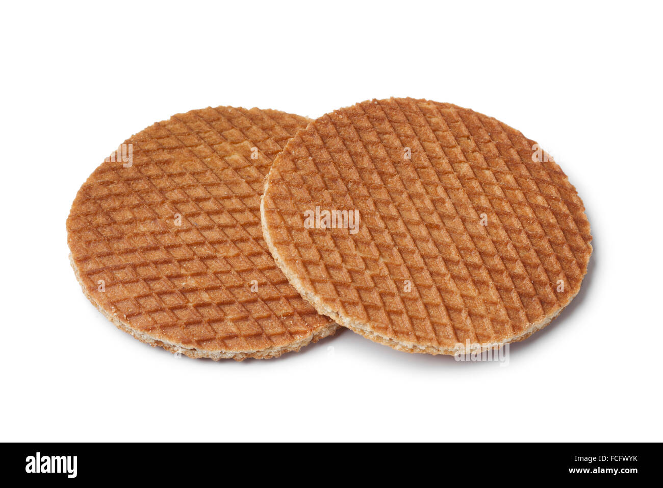 Two fresh baked Dutch syrup waffles on white background Stock Photo - Alamy