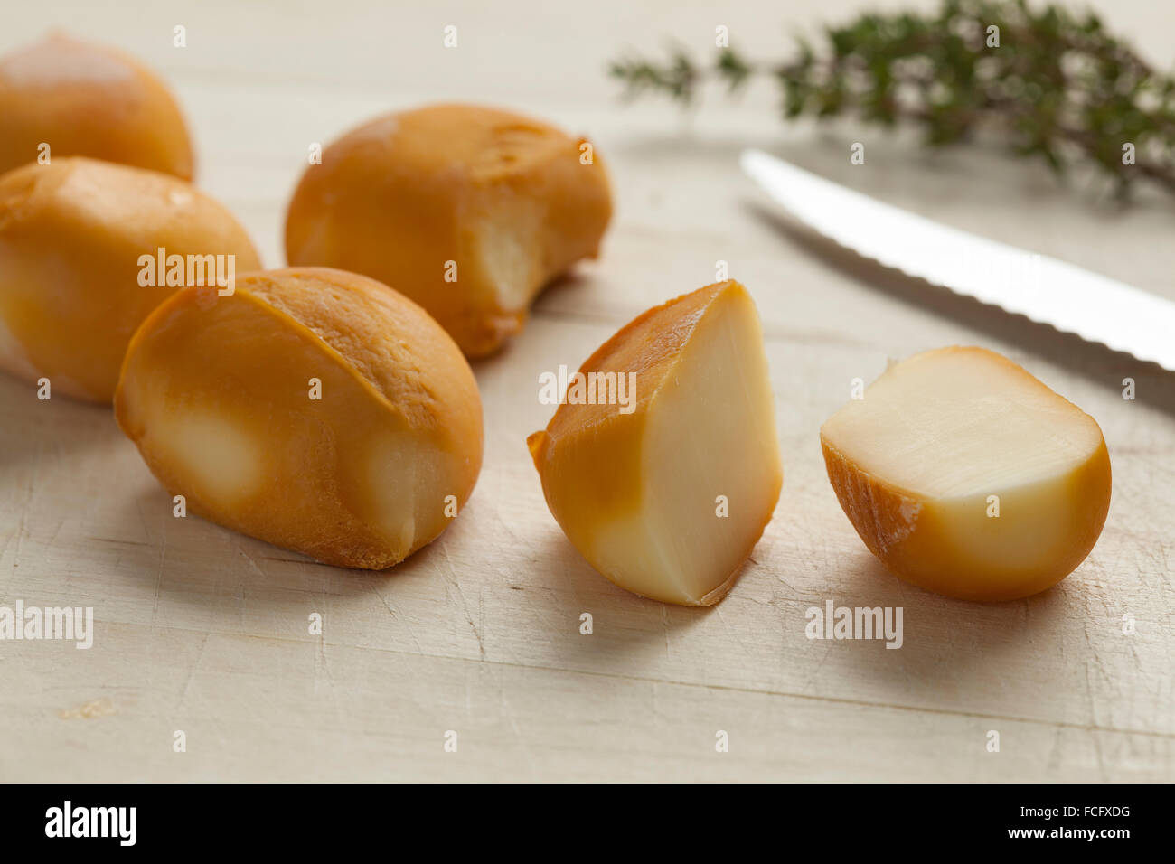 Smoked italian baby mozzarella Stock Photo - Alamy
