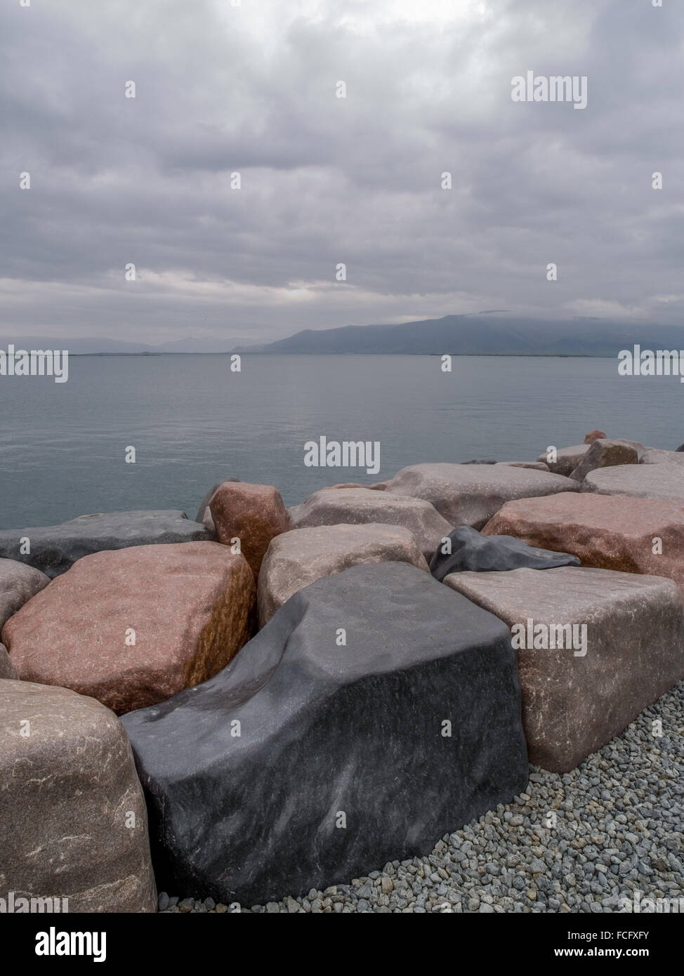 Large polished rocks by the sea in Reykjavik, Iceland in the spring ...