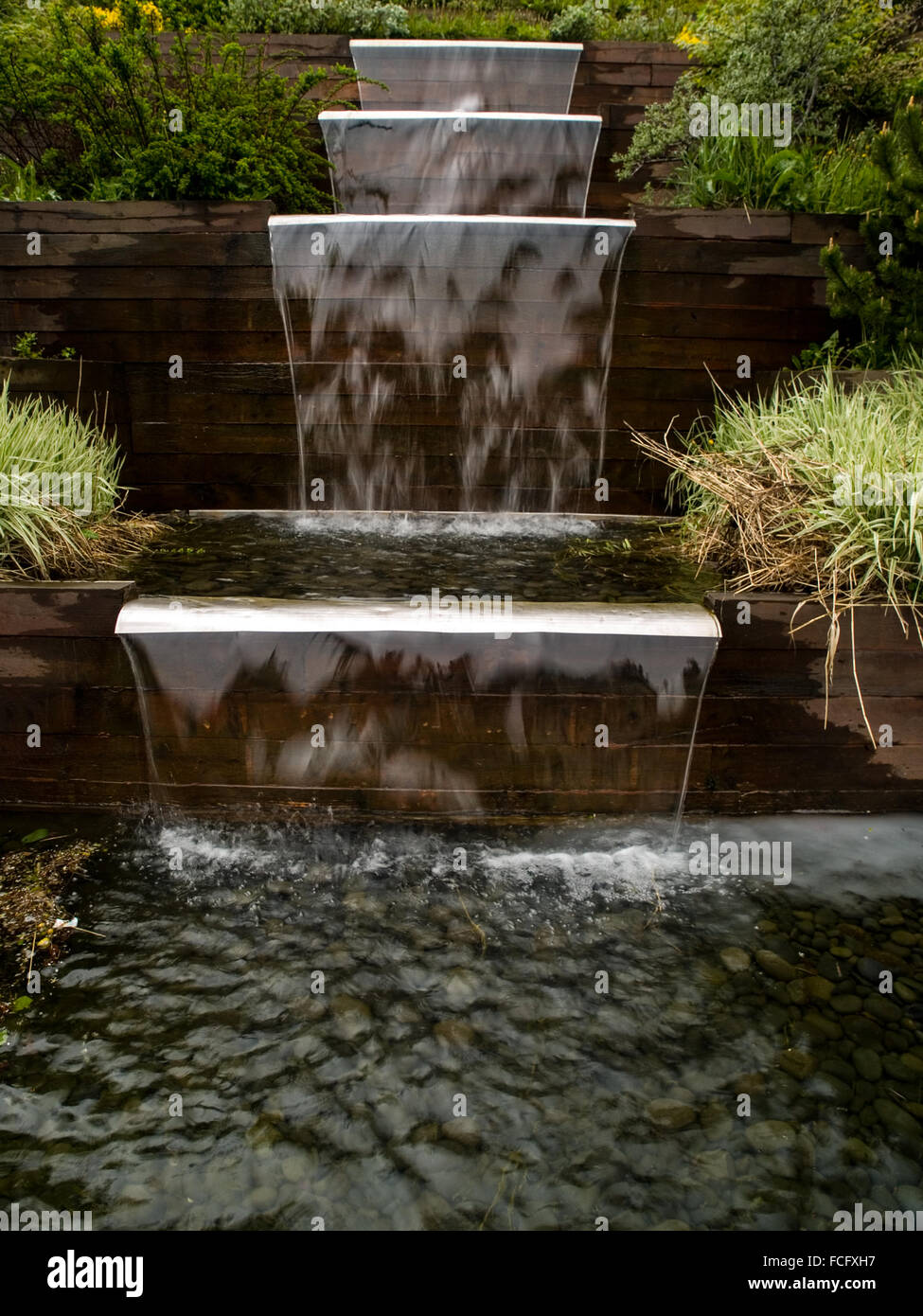 Cascading pond in landscaped garden in Akureyri, Iceland Stock Photo ...