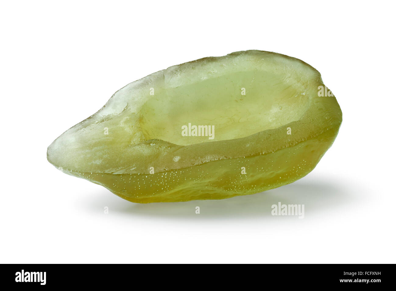 Sweet green candied succade on white background Stock Photo - Alamy